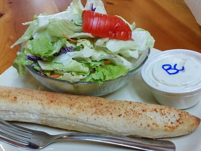 Who says you can't have your greens and eat pizza too? This fresh salad is the opening act to the main cheese event.