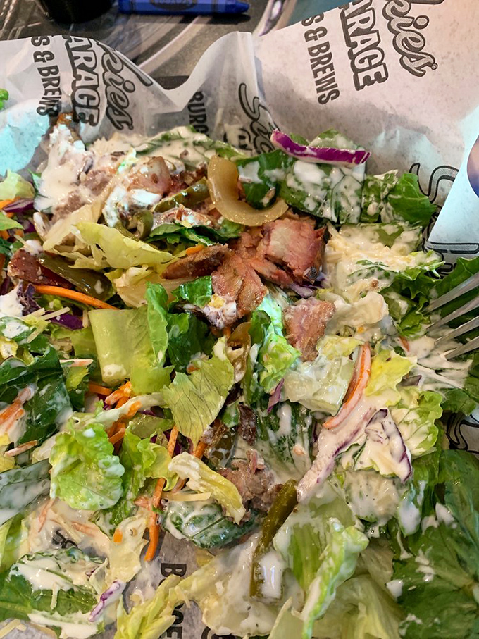 Who says you can't be health-conscious at a burger joint? This salad is like a garden party in your mouth!