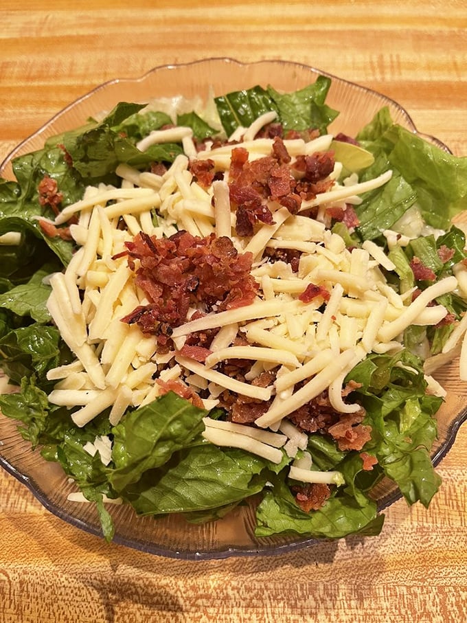 Salad sensation! This isn't just rabbit food &ndash; it's a crunchy, cheesy celebration that even the most devoted carnivore can appreciate.