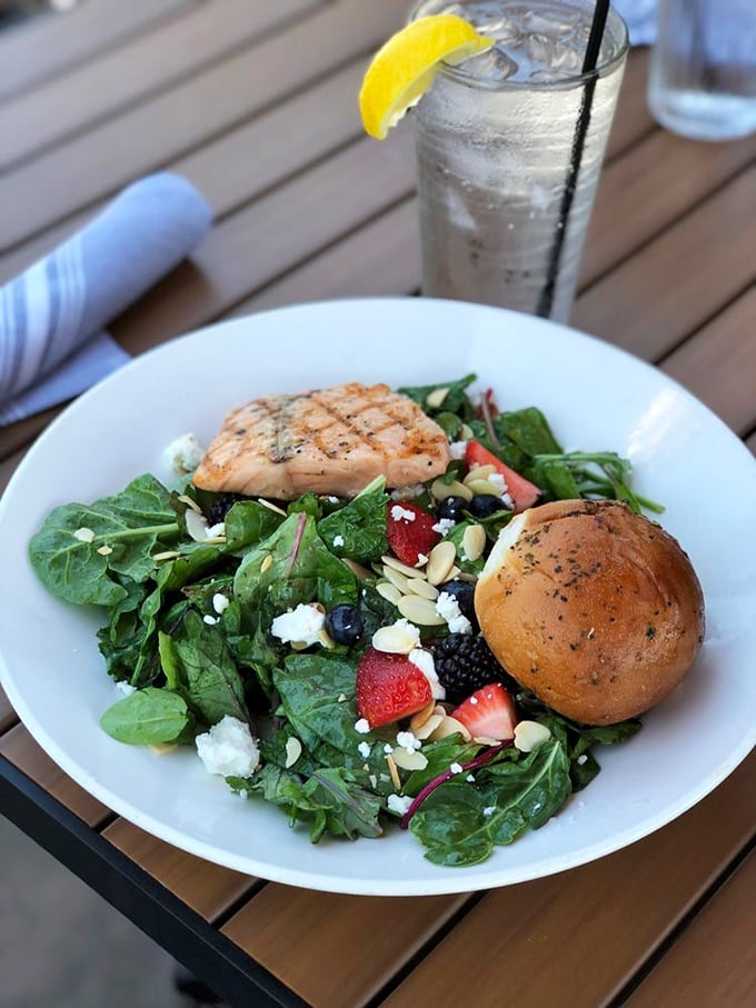 This isn't just a salad&mdash;it's nature's confetti celebrating grilled salmon with berries, feta, and greens playing supporting roles.