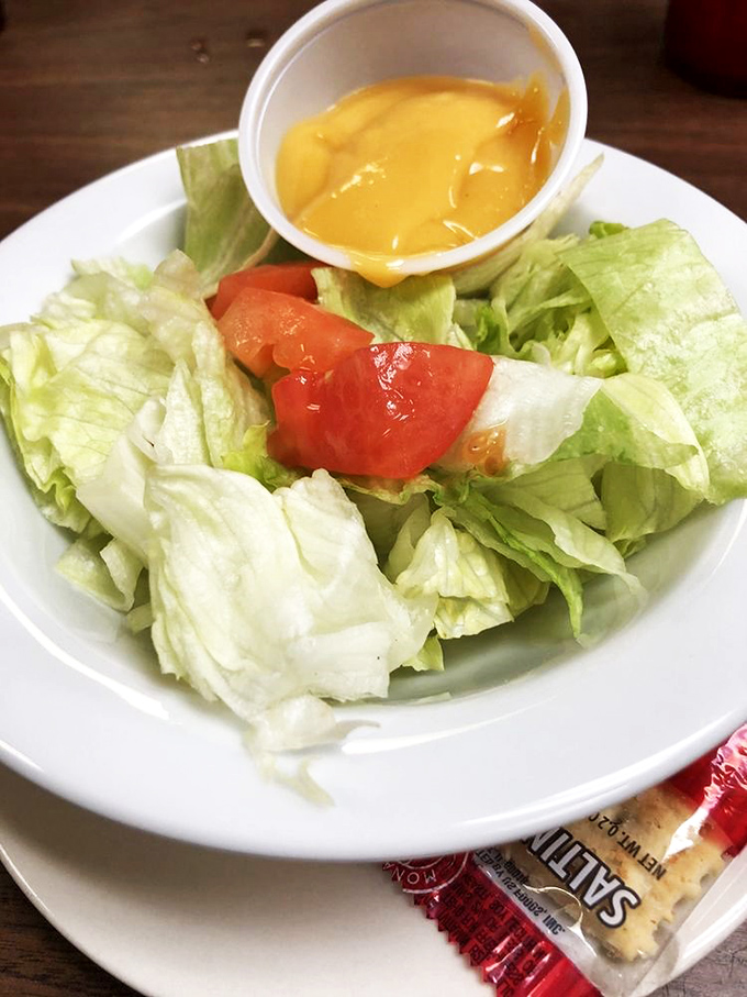 Even the salad looks like it's having a good time! A fresh opener before the main event &ndash; because every great meal needs a warm-up act.