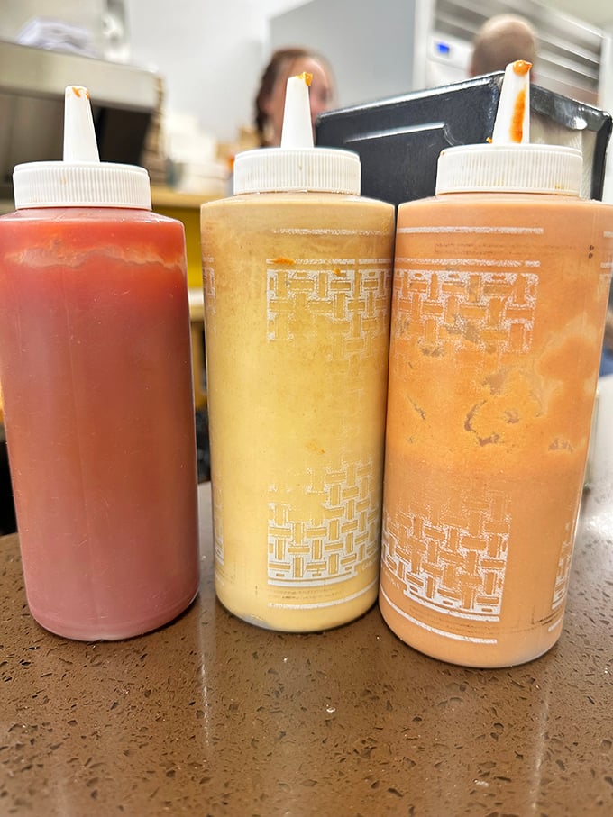 The holy trinity of condiments. These aren't just sauces, they're flavor enhancers that'll make your taste buds sing.