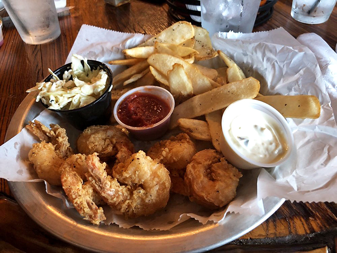 Shrimp on a silver platter? Don't mind if I do! These golden-fried crustaceans are like little nuggets of ocean treasure.