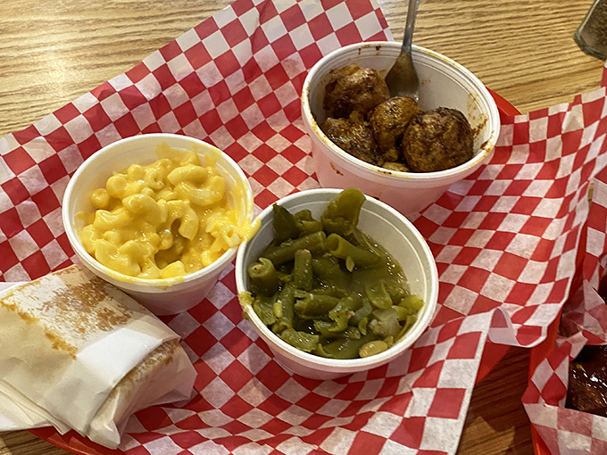 Mac and cheese, green beans, and what appear to be smoked meatballs&mdash;the supporting actors that deserve their own spotlight. Cornbread lurking just out of frame.