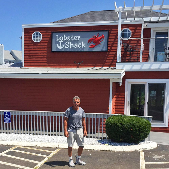 This sign isn't just pointing you to great food &ndash; it's guiding you to your happy place. Follow the red lobster, folks!