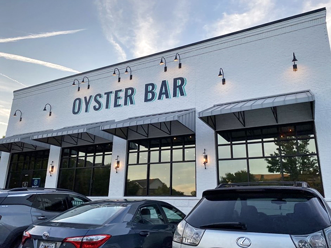 This isn't just a sign, it's a beacon of hope for seafood lovers. Follow the siren call of the Oyster Bar!