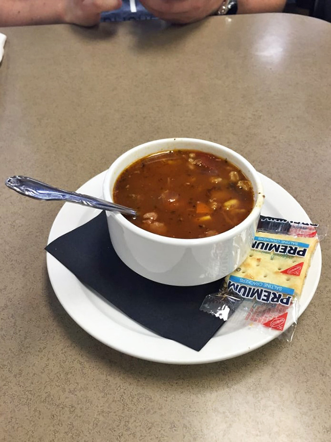 Soup's on! A steaming bowl of comfort that's like a warm hug for your taste buds. Don't forget to dunk your sandwich!