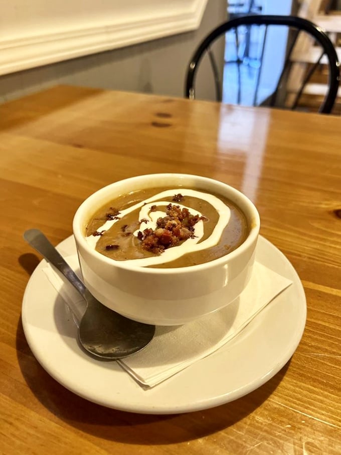 Soup's on! This steaming bowl of comfort looks like it could warm you up faster than a Swedish sauna on a chilly Kansas evening.