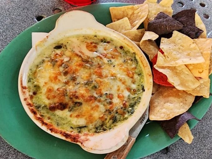 Dive into a sea of cheesy, garlicky goodness! This spinach dip is like a warm jacuzzi for your taste buds, complete with crispy chip lifeguards.