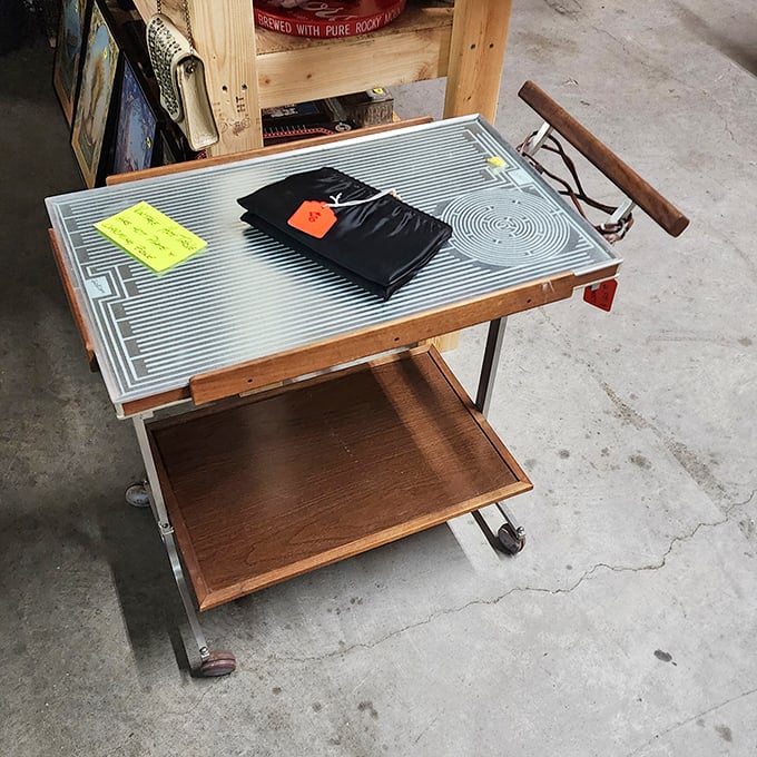This retro serving cart with its distinctive metal top is begging to host your next cocktail party.