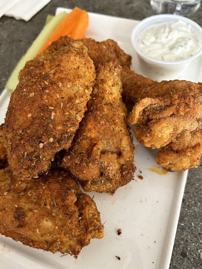 Wings that'll make you sing! These crispy, saucy delights are like a flavor explosion in your mouth. Who needs utensils anyway?