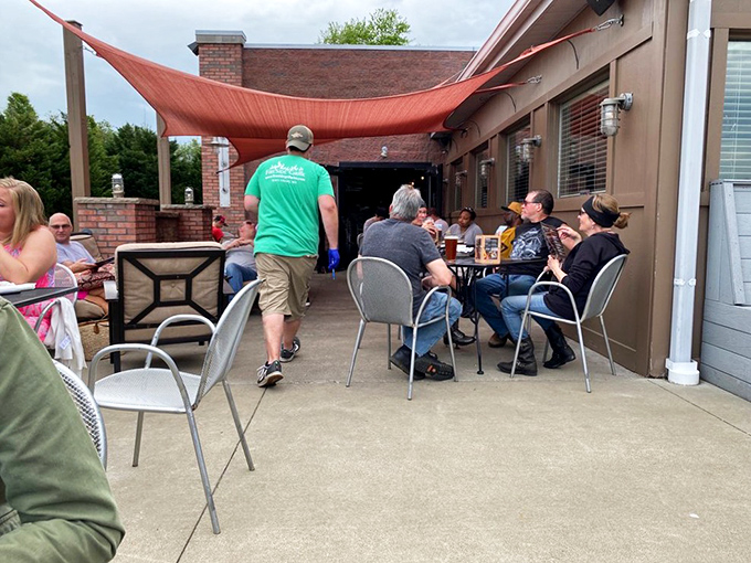 The outdoor patio offers fresh air dining under a rustic canopy&mdash;because sometimes wings taste even better with a side of sunshine.