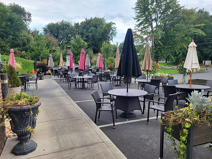 The outdoor patio offers al fresco dining surrounded by greenery&mdash;Connecticut's answer to dining in a secret garden.