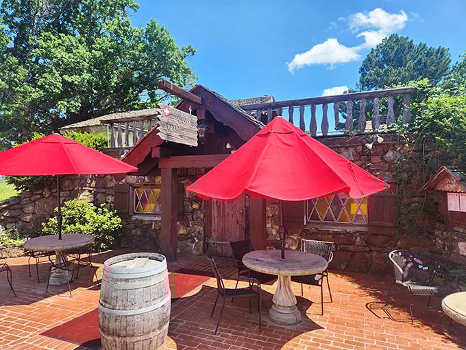 Outdoor seating that's more inviting than a hammock on a lazy Sunday. Red umbrellas add a pop of color to your al fresco feast.