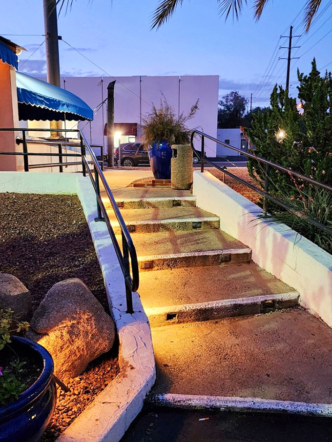 As night falls, the Salt Cellar's entrance beckons. Follow these steps to flavor town &ndash; it's a journey your taste buds won't forget.