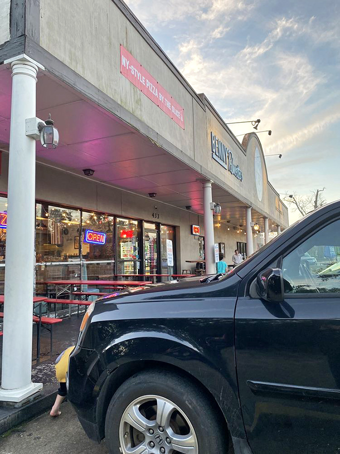 As the sun sets, the pizza party's just getting started. Benny's: where night owls come for their cheese fix.