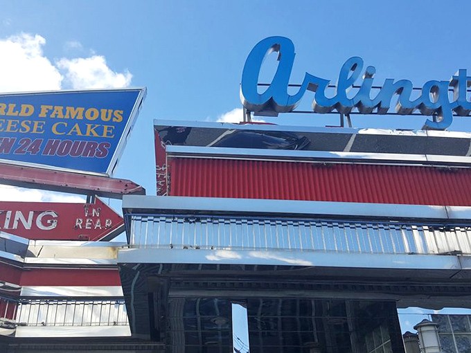 "World Famous Cheese Cake" proclaims the sign, because in New Jersey, even the desserts have an attitude.
