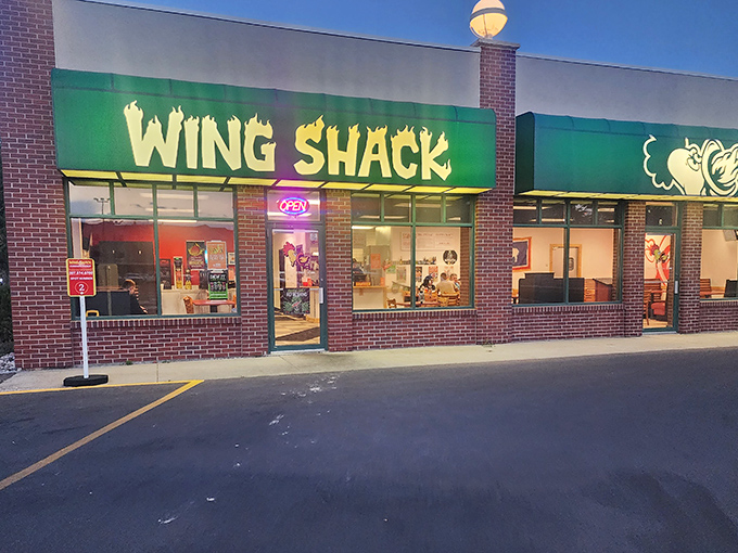 As night falls, the Wing Shack beckons. It's like a lighthouse, but instead of guiding ships, it guides hungry souls to flavor town.