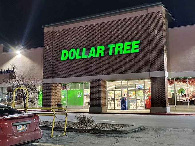 After dark, the Dollar Tree transforms into a glowing green beacon of budget-friendly possibilities in the Sandy night.