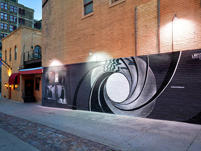 The final test: Can you spot the secret entrance? This mural holds more than meets the eye.