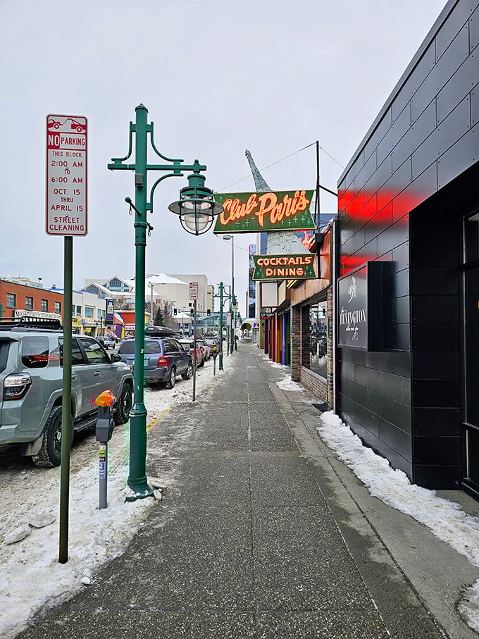 Winter wonderland meets culinary paradise. Club Paris stands as a beacon of warmth and flavor amidst the Alaskan chill &ndash; just follow the neon glow!