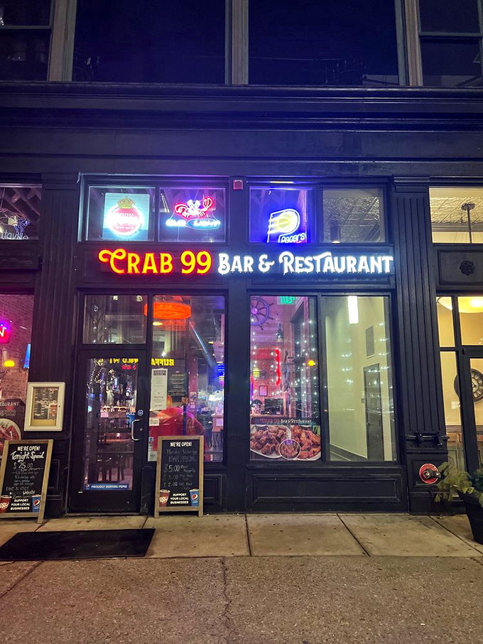 As night falls, Crab 99 transforms into a beacon of deliciousness. Its neon glow whispers, "Come in, the water's fine... and so is the food!"