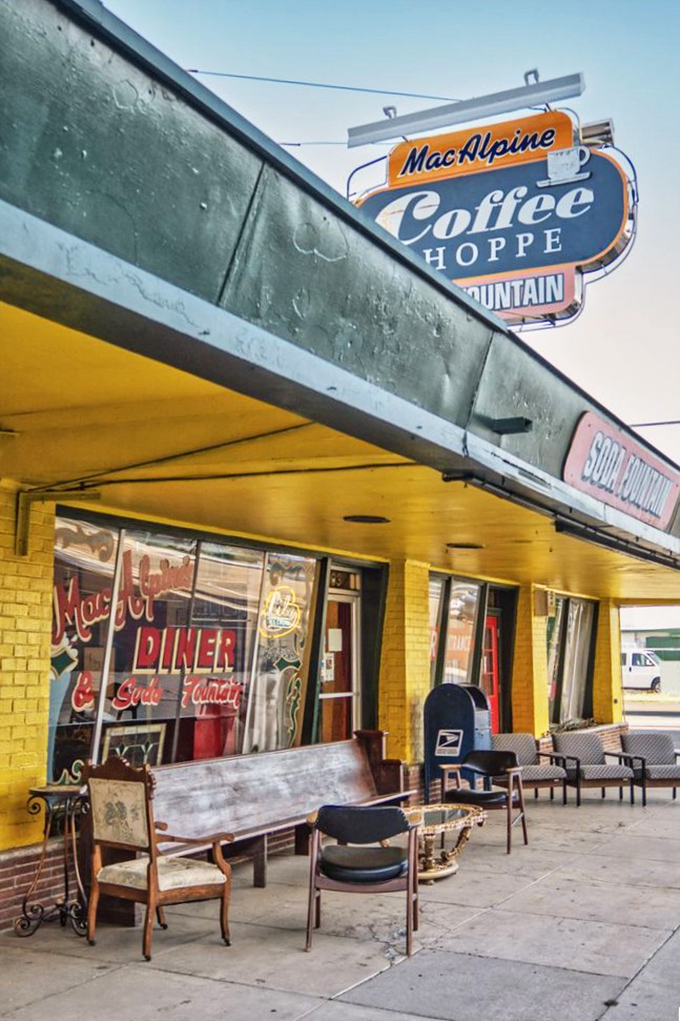 Your portal to the past awaits! MacAlpine's exterior is like a yellow brick road leading straight to flavor town. Dorothy, we're definitely not in 2023 anymore!