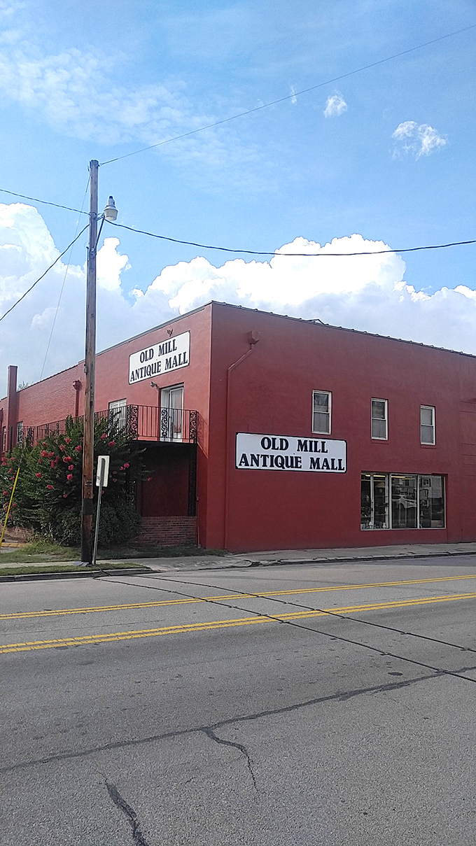 Don't judge an antique mall by its cover! This unassuming exterior hides a treasure trove of history, just waiting to be explored.