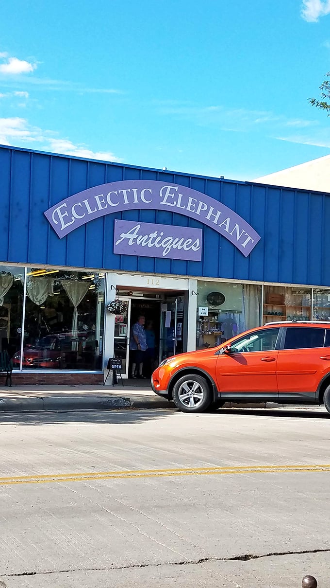 Blue skies and bygone treasures await! The Eclectic Elephant stands proud against the Wyoming sky, daring you to resist its siren call of antiquing adventure.