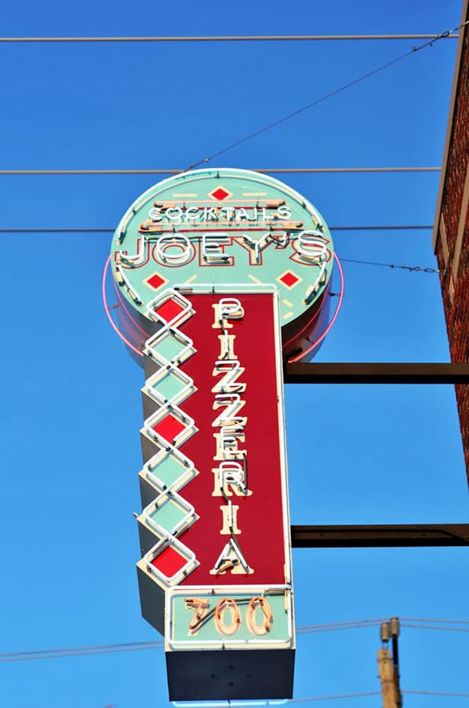 Joey's sign: A retro-chic masterpiece that could make Times Square jealous. It's not just a sign, it's a beacon of hope for the pizza-starved.