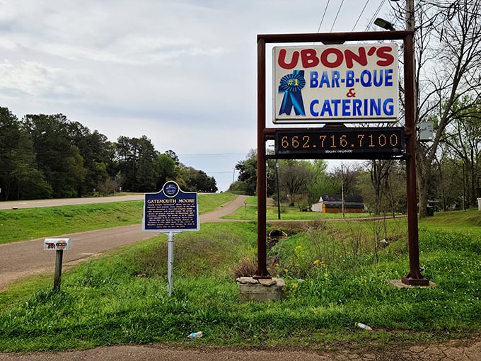 This sign isn't just pointing you to great barbecue; it's guiding you to your new happy place. Follow the smoke signals!