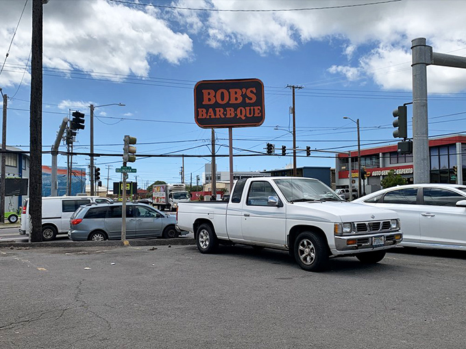 Follow the sign to barbecue bliss. Bob's: Where parking lots become gateways to gastronomic adventures.