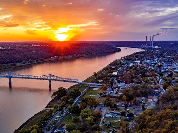 Sunset bathes Madison in Hollywood lighting as the Ohio River curves gracefully past the town, a moment when even cynics believe in magic.