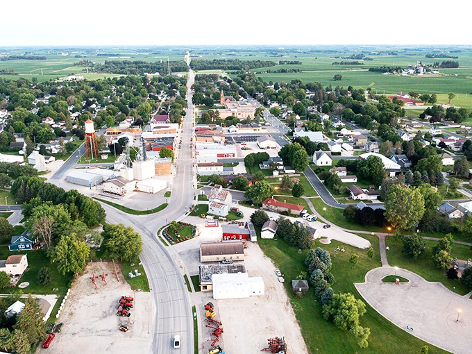 Harmony from above: where small-town America meets big sky country. It's like someone shrunk a Norman Rockwell painting and sprinkled it across the landscape!