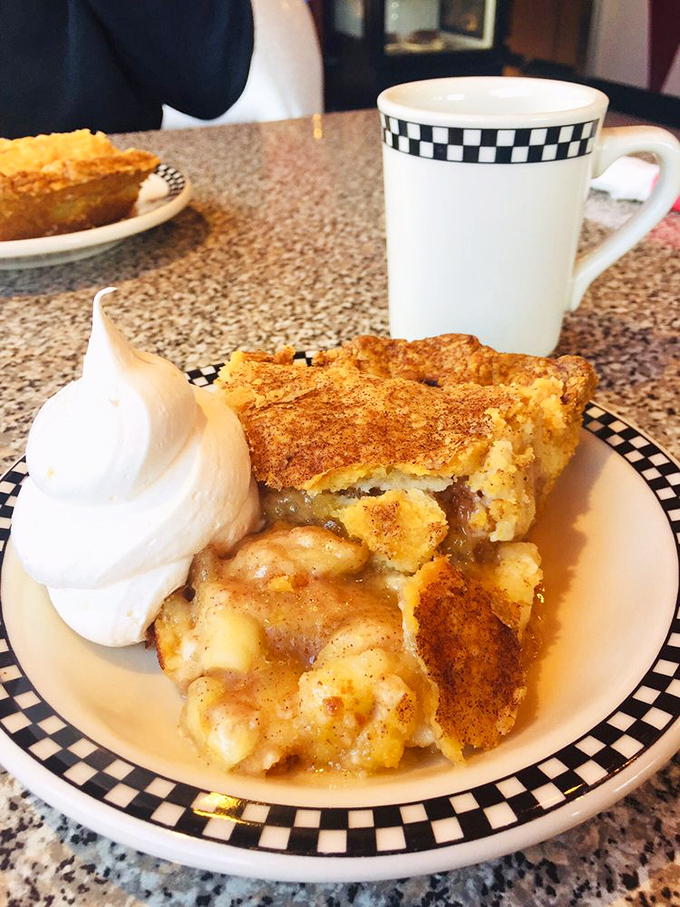 A slice of heaven, &agrave; la mode. This apple pie is flaky, gooey, and screaming for a scoop of vanilla ice cream.