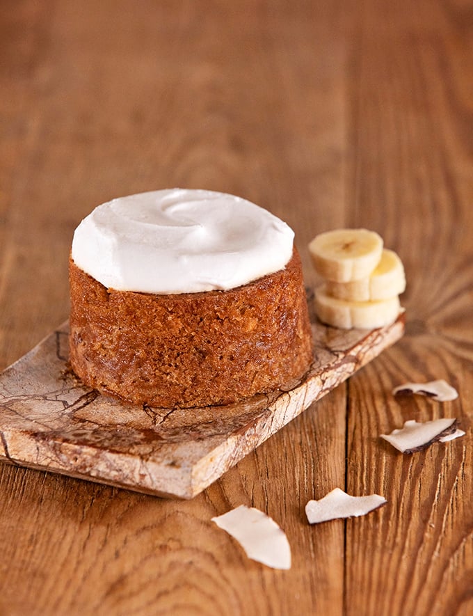 Hello, gorgeous! This Banana Nut Cake is so pretty, it almost seems a shame to eat it. Almost. Pass the fork, please!