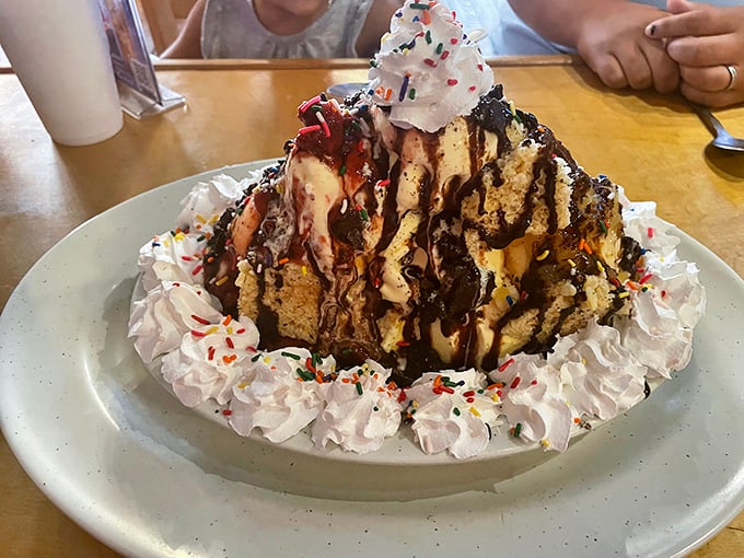 This banana split isn't just dessert; it's a childhood dream come true. It's big enough to share, but trust us, you won't want to!