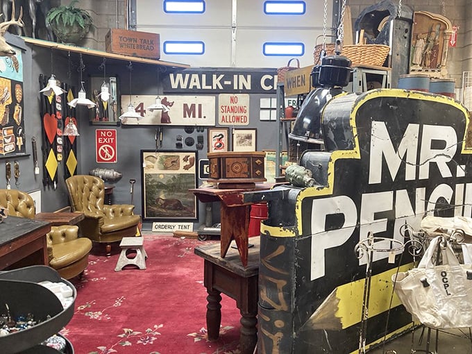 Step right up to the "Walk-In Cl...oset of Wonders"! This booth is where vintage signs and retro furniture collide in glorious chaos.