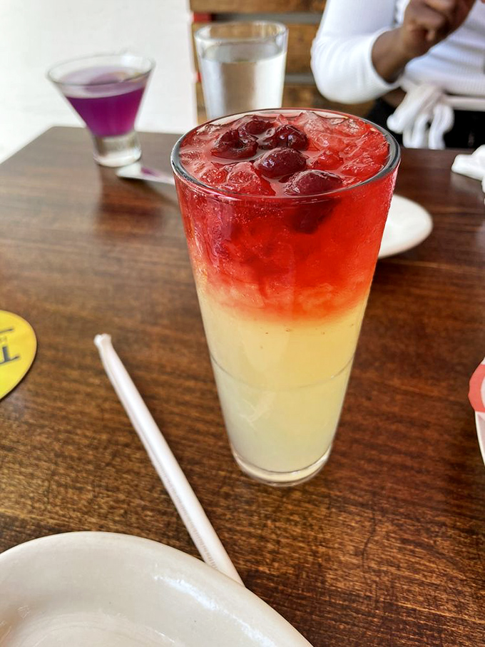 This drink is like a sunset in a glass. Sip slowly and let your worries drift away on a citrusy tide.