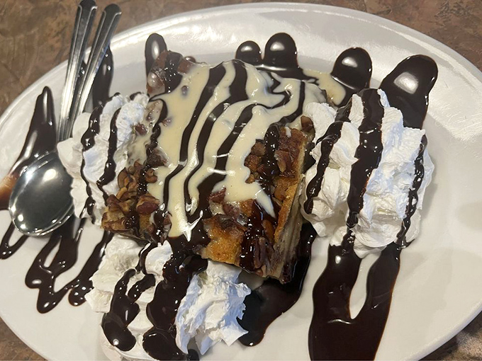 This isn't just dessert&mdash;it's the grand finale your taste buds deserve. Bread pudding with chocolate drizzle that makes you consider ordering seconds before finishing firsts.