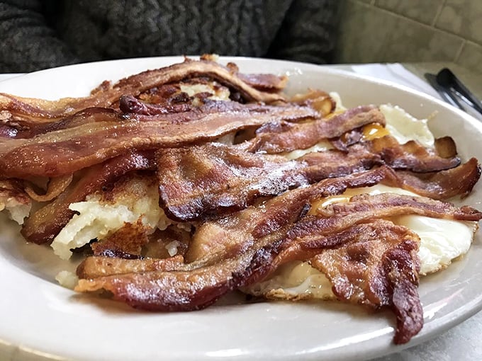 Bacon arranged like a work of abstract art &ndash; crispy, glistening, and making a compelling argument that everything else on the plate is merely a supporting actor.