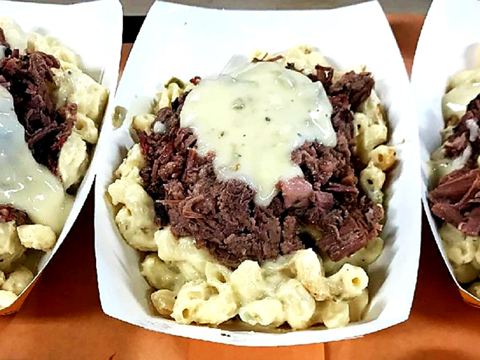 Brisket and mac, a match made in heaven! This dish is like the BBQ version of Romeo and Juliet, minus the tragic ending.