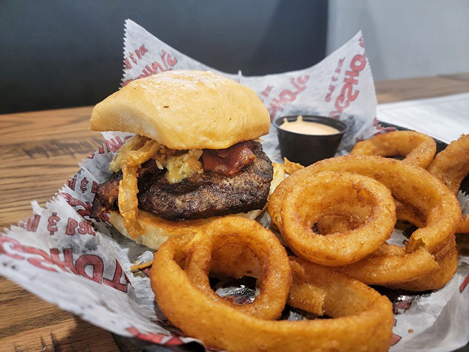 The burger that launched a thousand cravings! Nestled in a sea of crispy onion rings, it's a island paradise for your palate.
