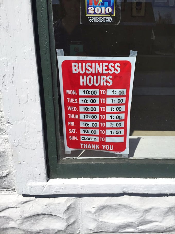 The most important sign in town! These hours are shorter than a New England summer, but twice as sweet.