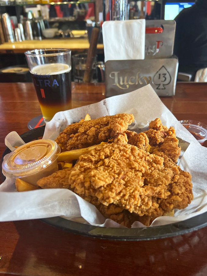 Finger-lickin' good! These golden chicken tenders are the ultimate comfort food sidekick to Lucky 13's legendary burgers.