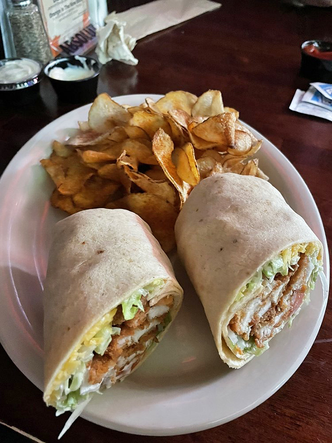 This wrap is proof that good things come in tortilla packages. With homemade chips on the side, it's a meal that says, "You deserve this."