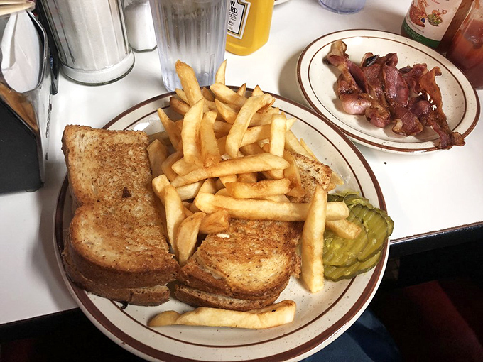 The sandwich that comfort food dreams are made of! Melty cheese, crispy chicken, and golden fries &ndash; a trio so perfect, it should have its own Grammy category.