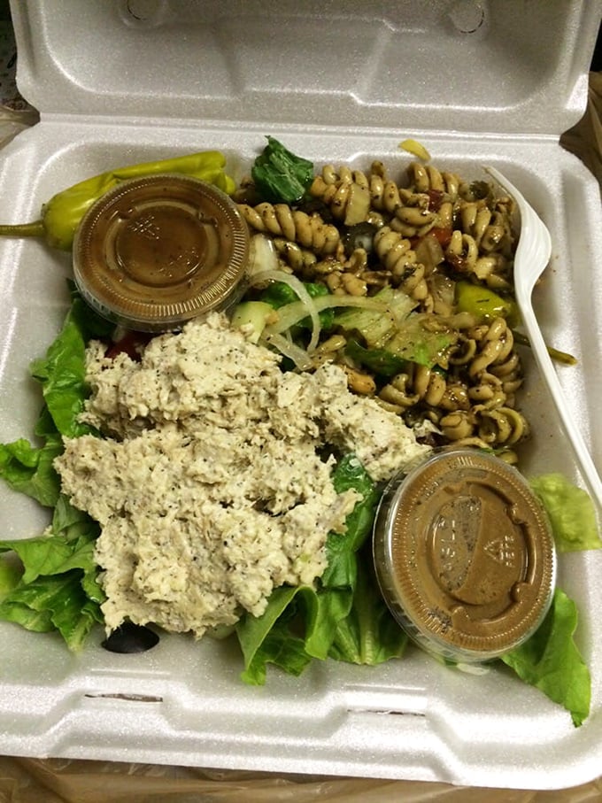 Chicken salad or work of art? This plate is a symphony of flavors and textures. It's like a picnic decided to get all fancy.