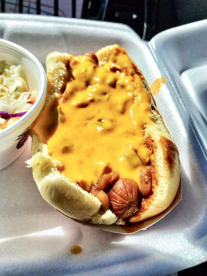 The humble hot dog, elevated to art form with a river of chile con queso &ndash; proof that simple pleasures make the best memories.
