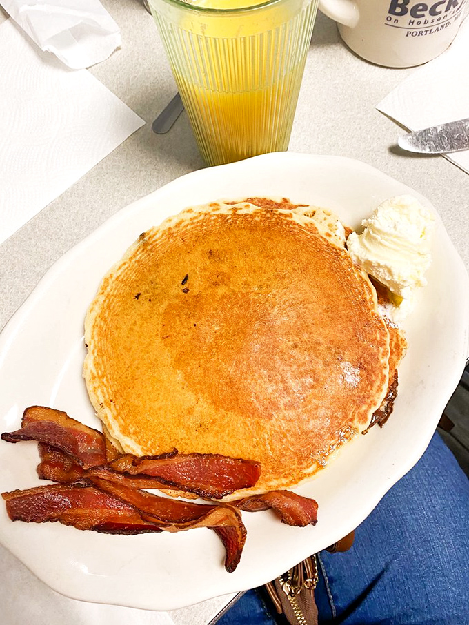 Chocolate chip pancakes that could make even Cookie Monster swoon, with a side of bacon for good measure.